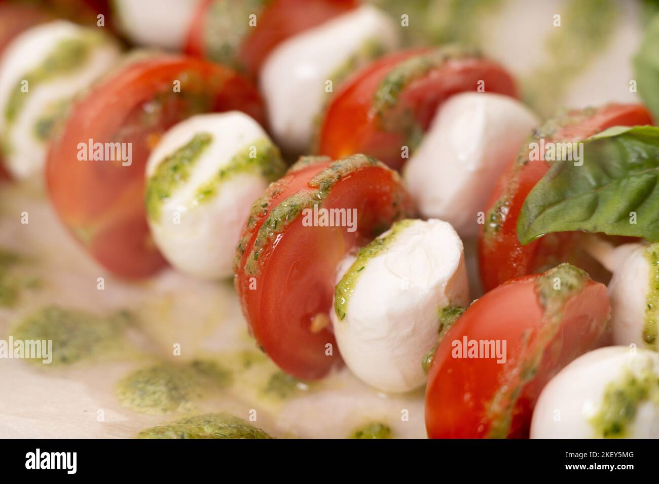 Italian caprese salad with tomato mozzarella and basil, macro shot ...