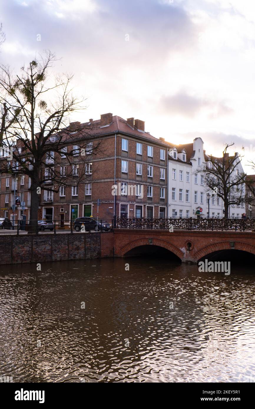 Old town in Gdansk. The riverside on Granary Island reflection in ...