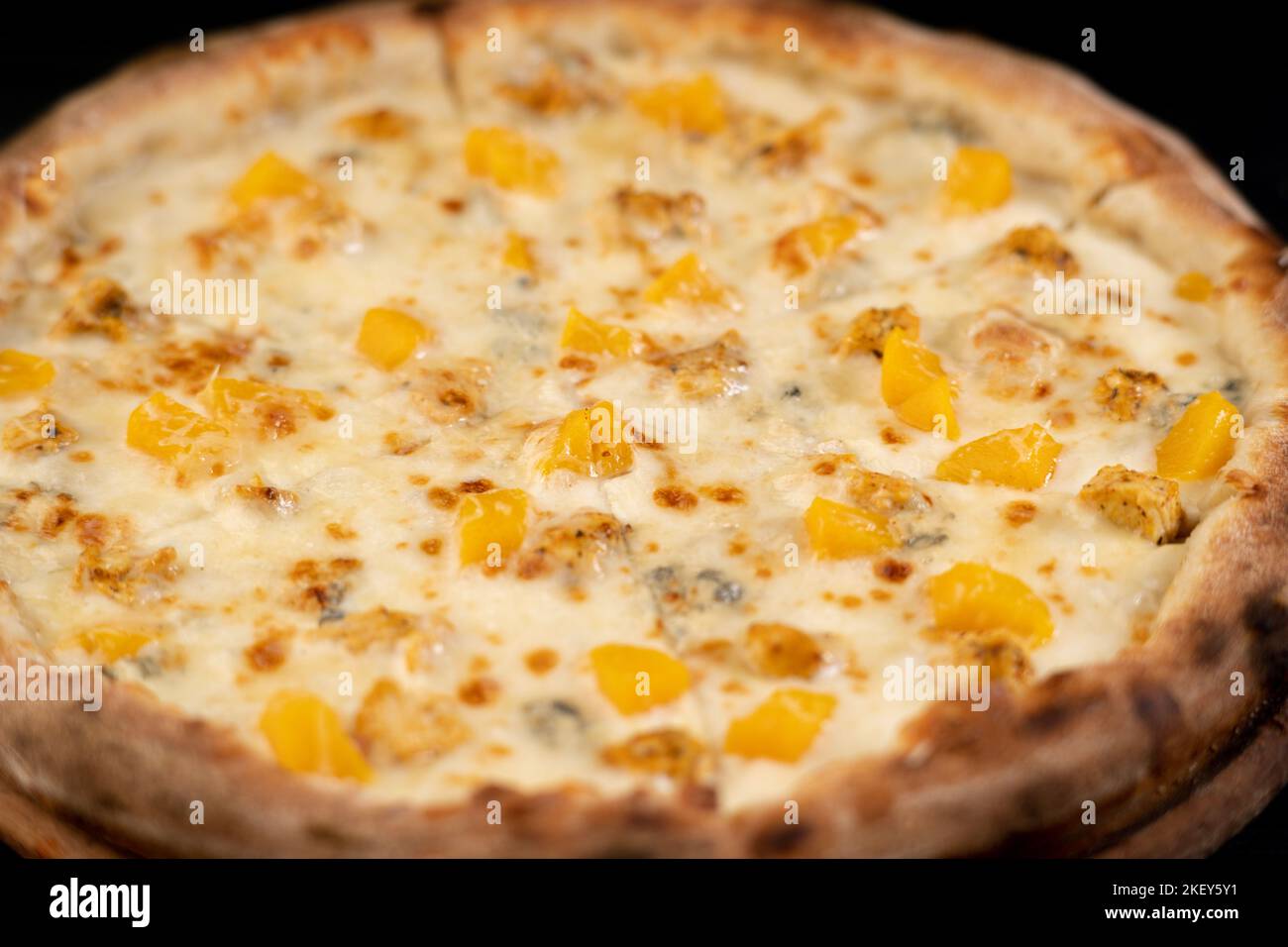 Sweet dessert pizza or brazilian pizza with peach, nuts and gorgonzola ...