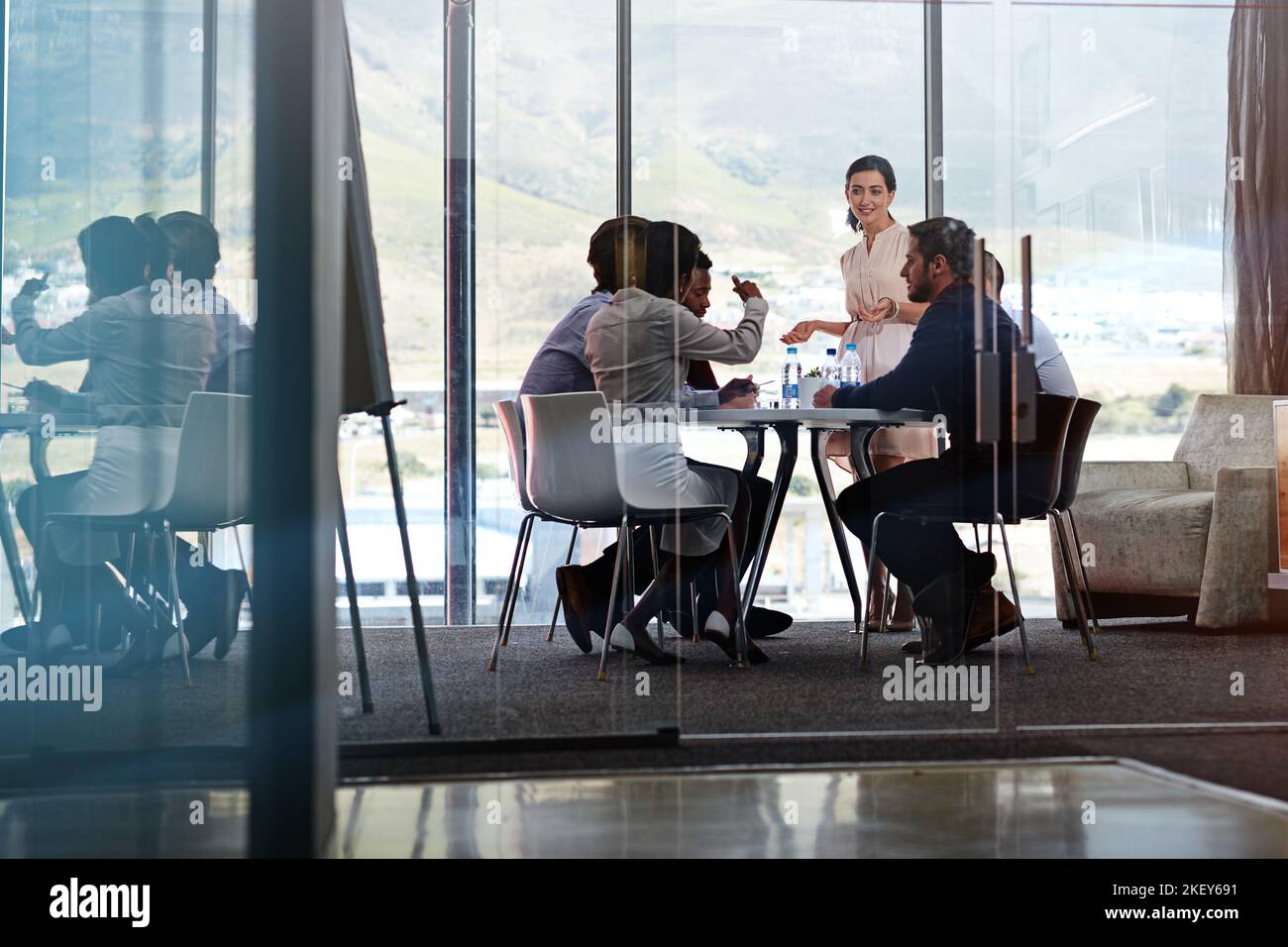 Strategy session in progress. a businesswoman giving a presentation to ...