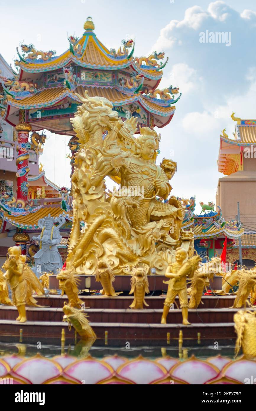 Golden Naja statue in Wihan Thep Sathit Phra Ki Ti Chaloem temple or ...