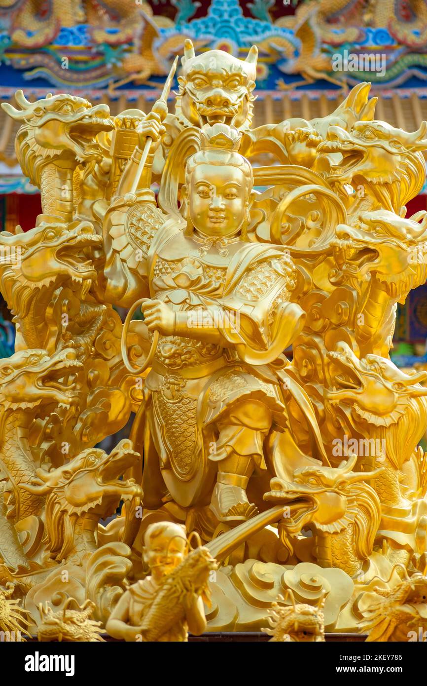 Golden Naja statue in Wihan Thep Sathit Phra Ki Ti Chaloem temple or Naja shrine, the famous ...