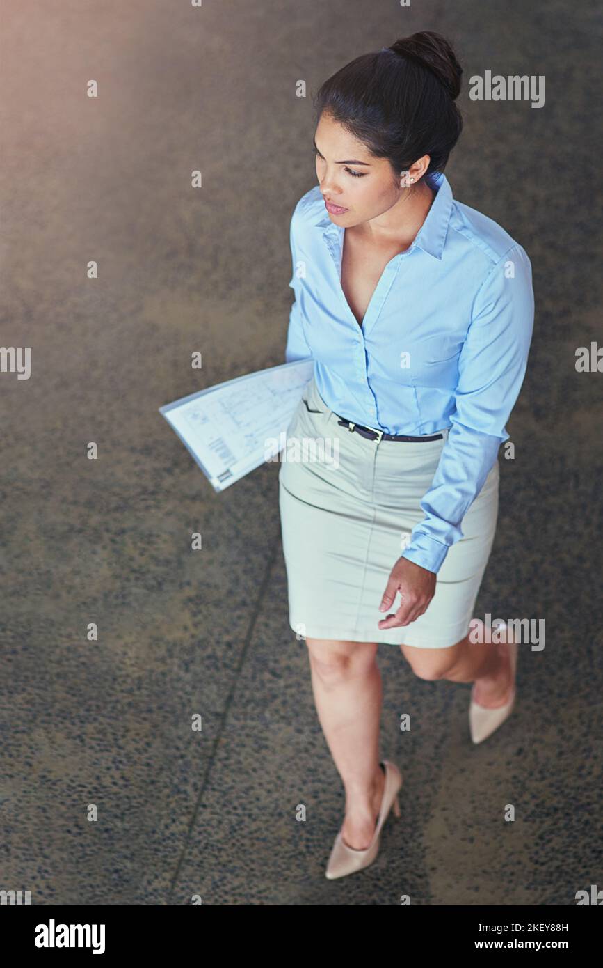 Shes ahead of the pack. High angle shot of a confident young ...