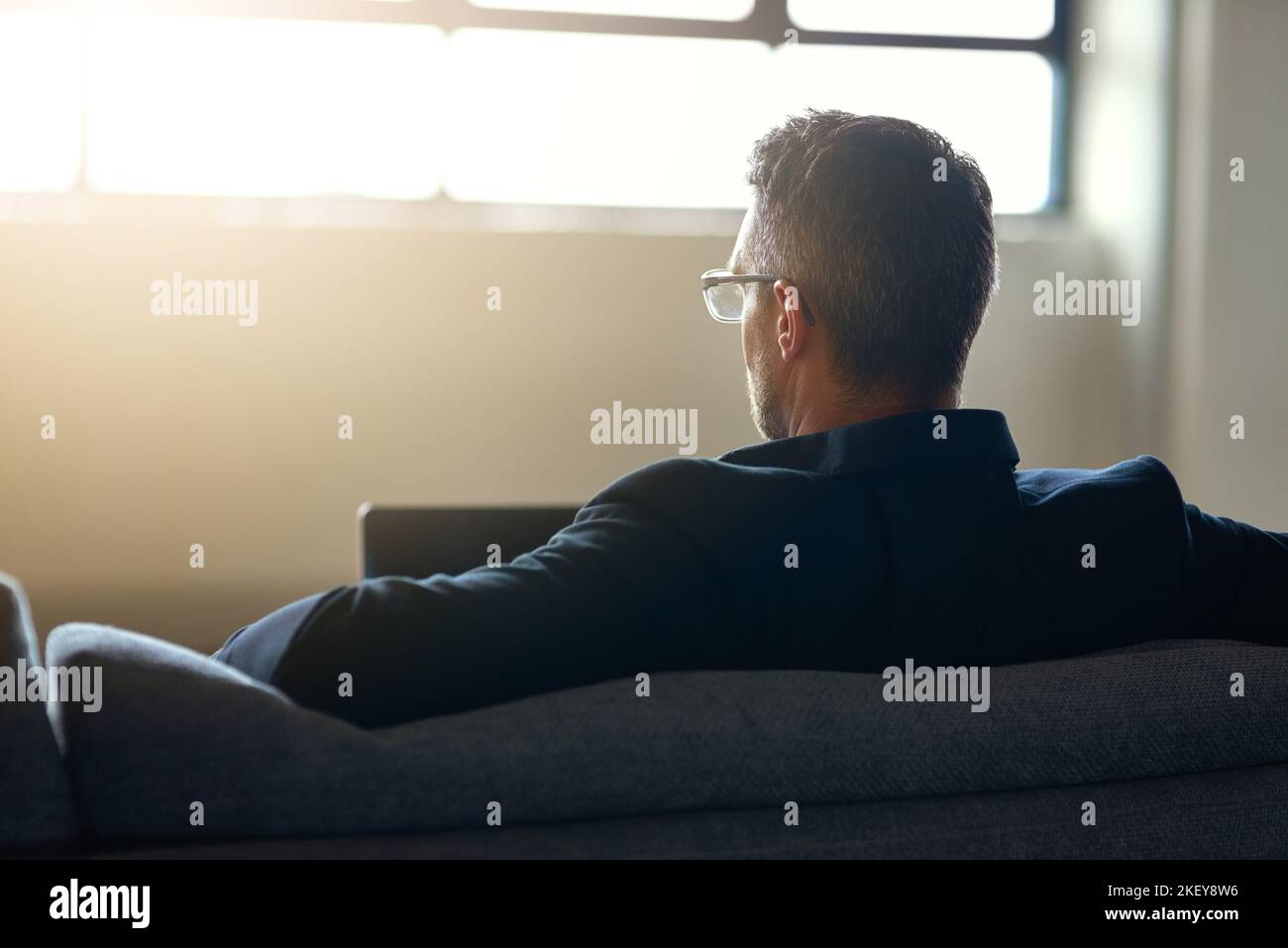 Man uncomfortable sitting hi-res stock photography and images - Alamy