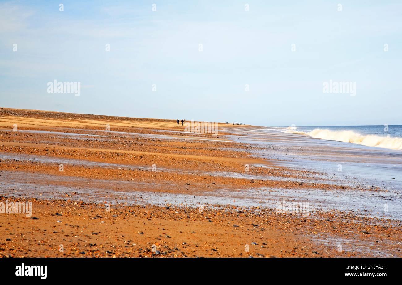 A view of the beach below the shingle ridge at low water during a ...