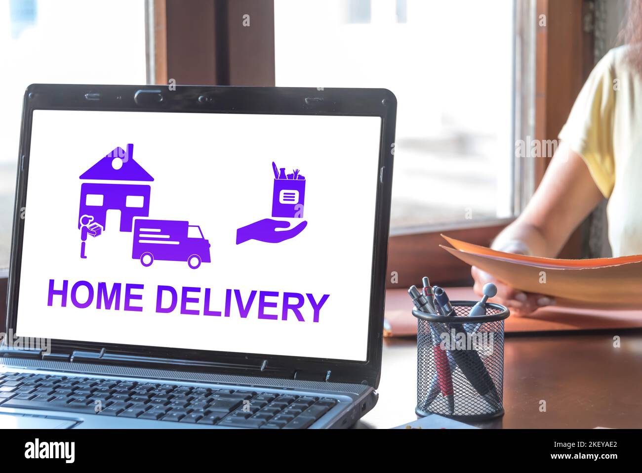 Laptop screen displaying a home delivery concept Stock Photo - Alamy
