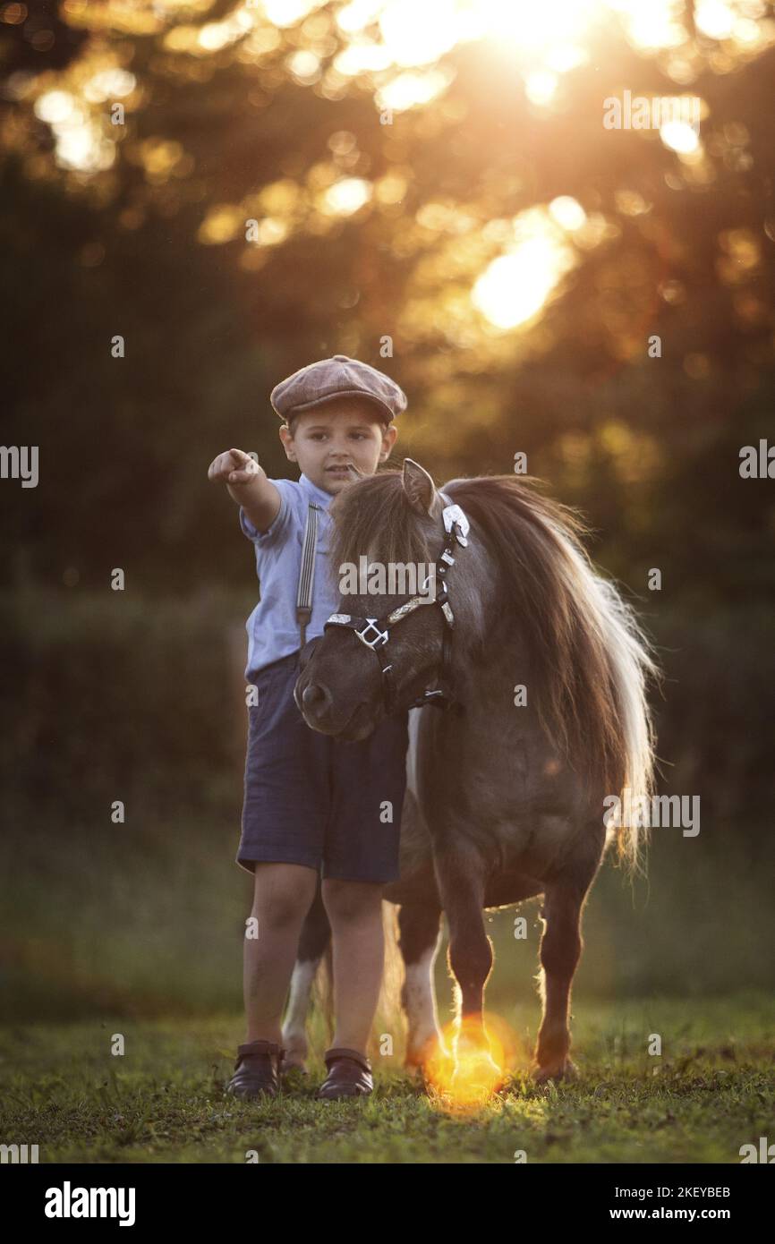 boy and pony Stock Photo - Alamy