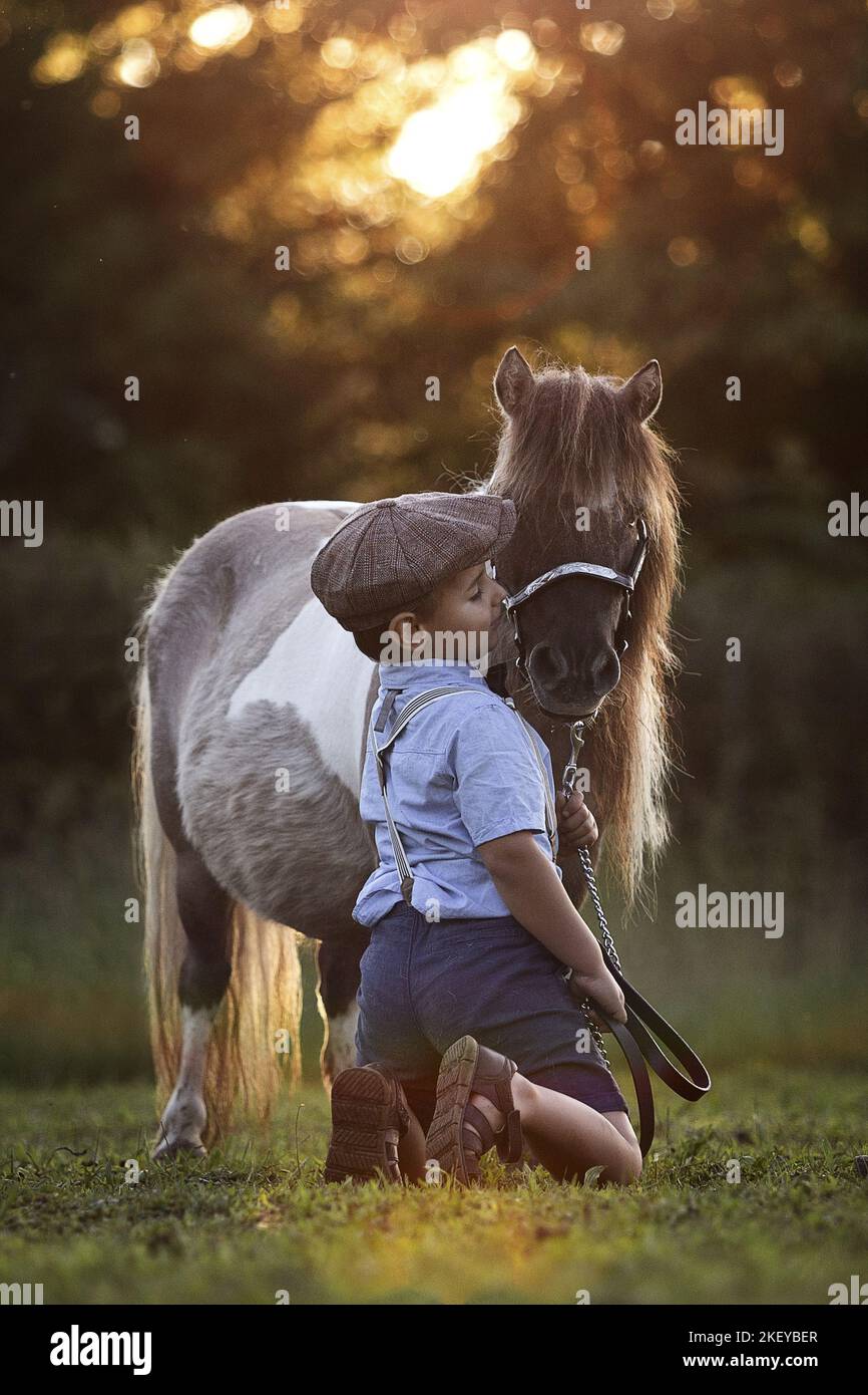 boy and pony Stock Photo - Alamy