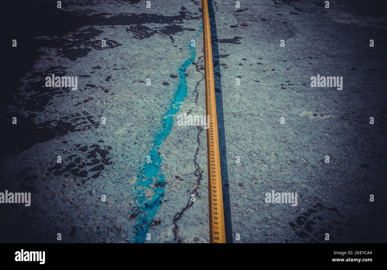 Measuring ruler on a concrete wall texture. The concept of renovation ...