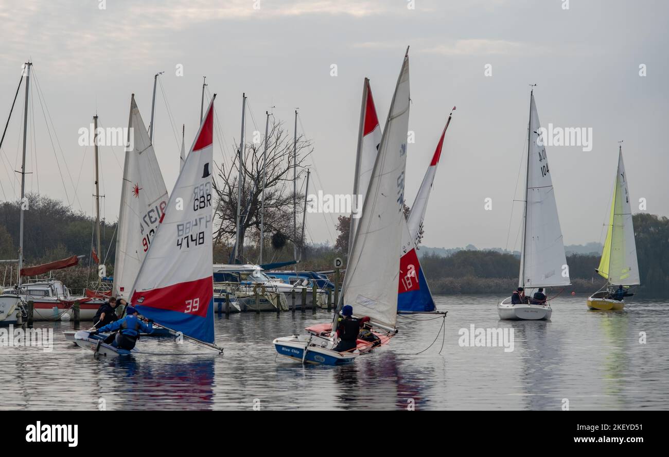 Horning, Norfolk, UK - 13 November 2022. Kids sailing topper boats on ...