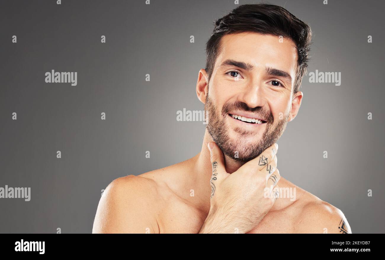Skincare, beauty and portrait of man in studio with smile isolated on gray background for body ...