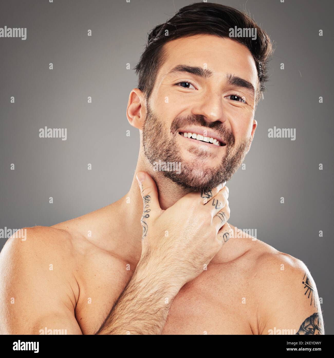 Skincare, wellness and portrait of man with smile isolated on gray background in studio. Beauty ...