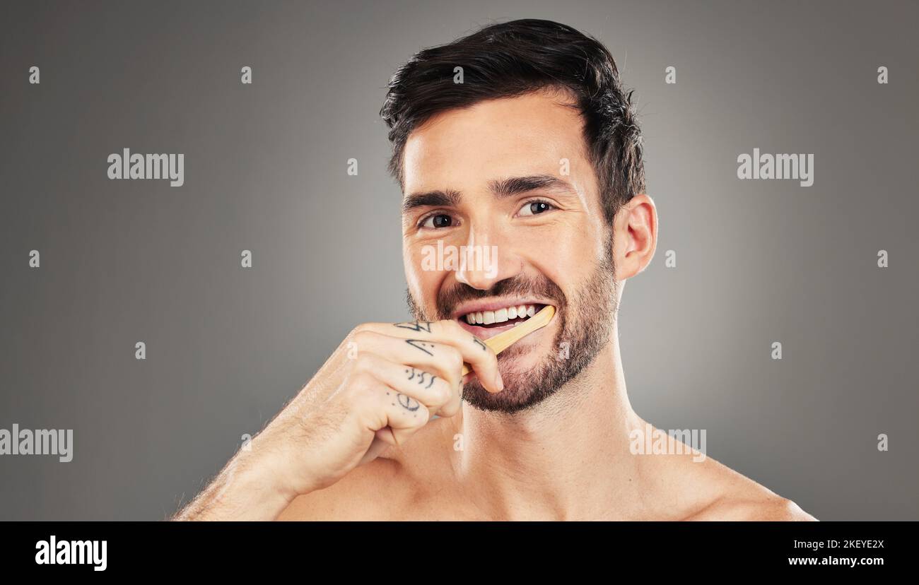 Man, brushing teeth and dental healthcare for beauty smile or grooming morning routine with ...