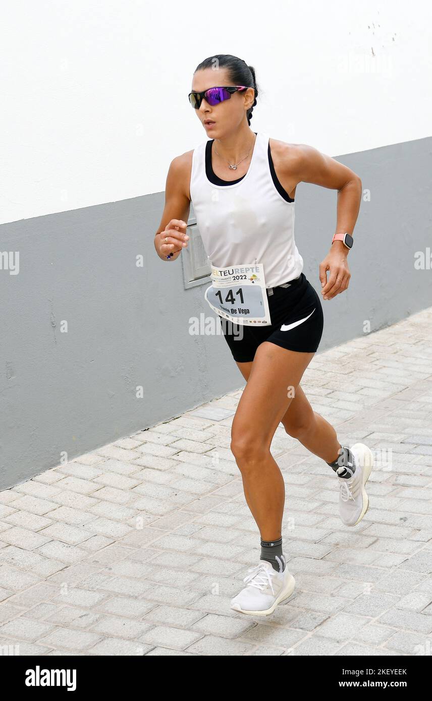 People running during the Ciutadella Half Marathon in Menorca, Spain ...