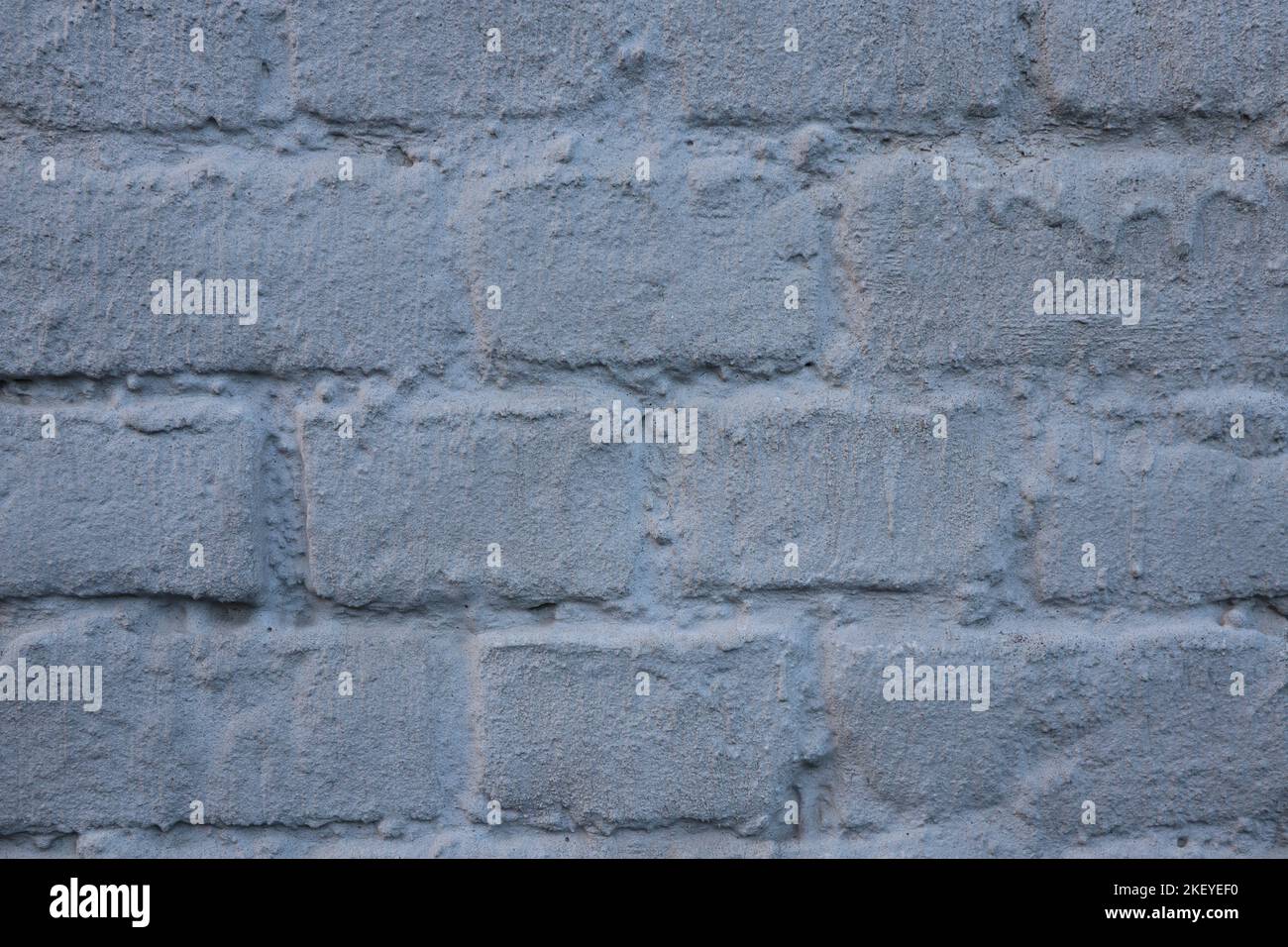 Painted brick wall wallpaper Stock Photo - Alamy