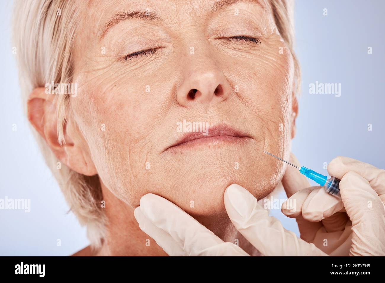 Botox, beauty and senior woman face with hyaluronic acid injection for ...