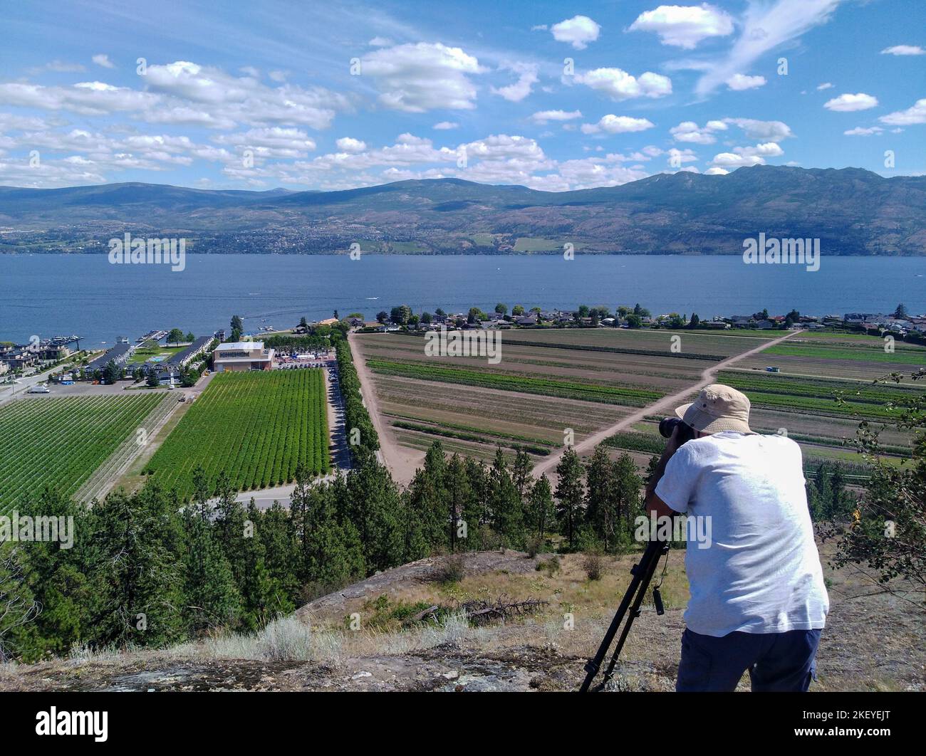 Active senior Caucasian white man taking photograph of the landscape ...
