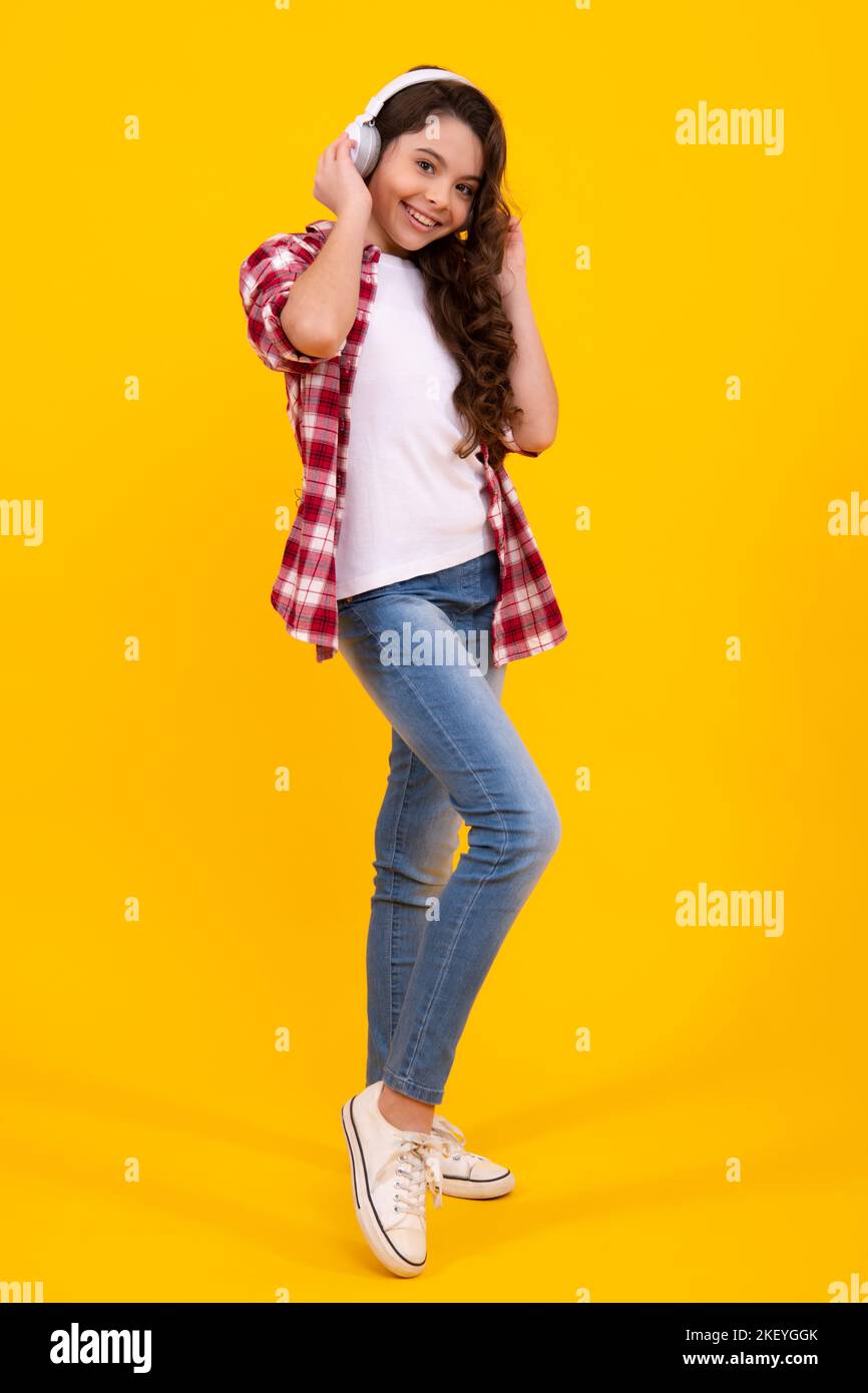 Child music concept. Teenager child girl dances in rhythm of melody ...