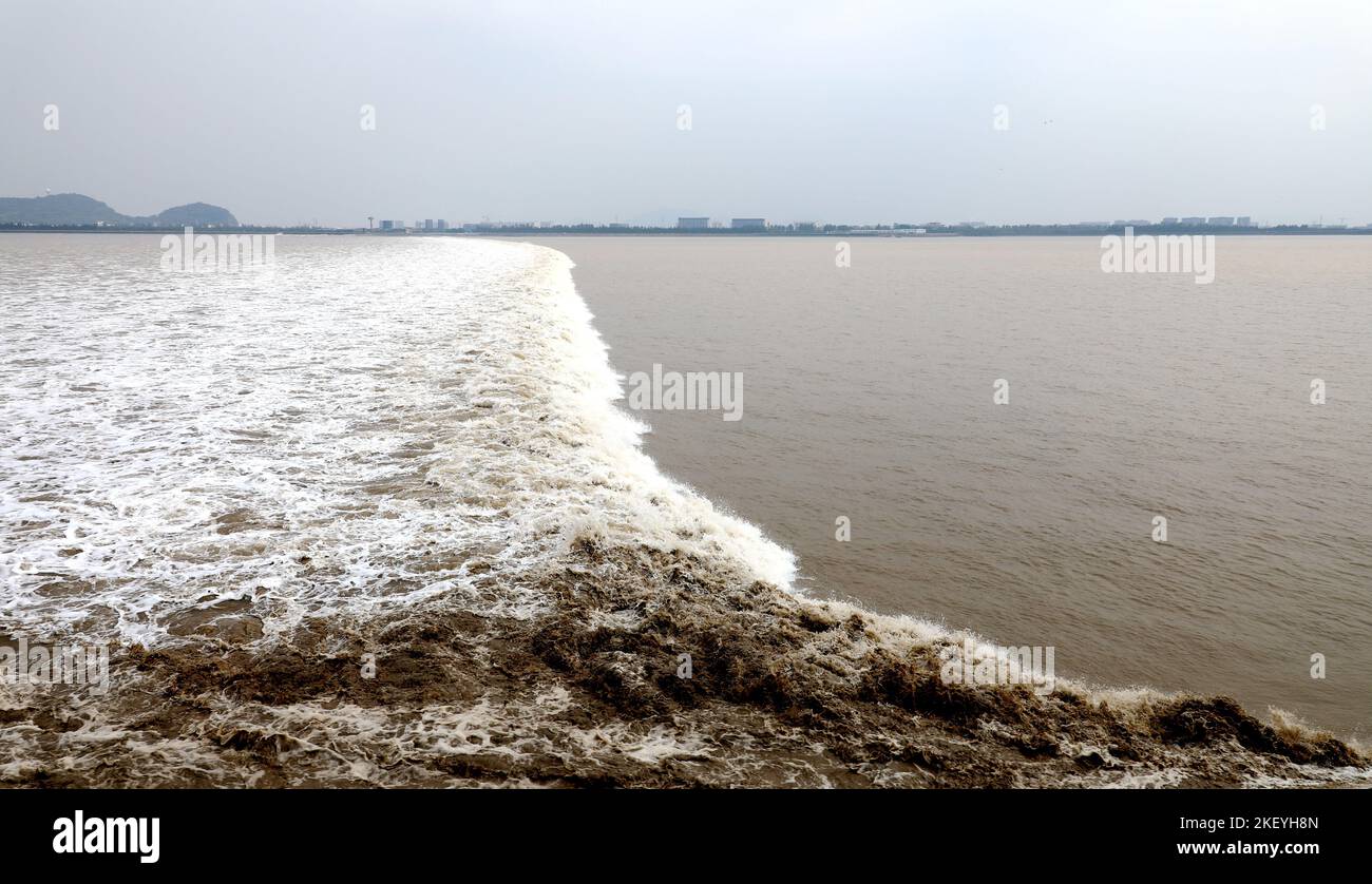 The One-line bore scene of the Qiantang River tide, Hangzhou City, east ...