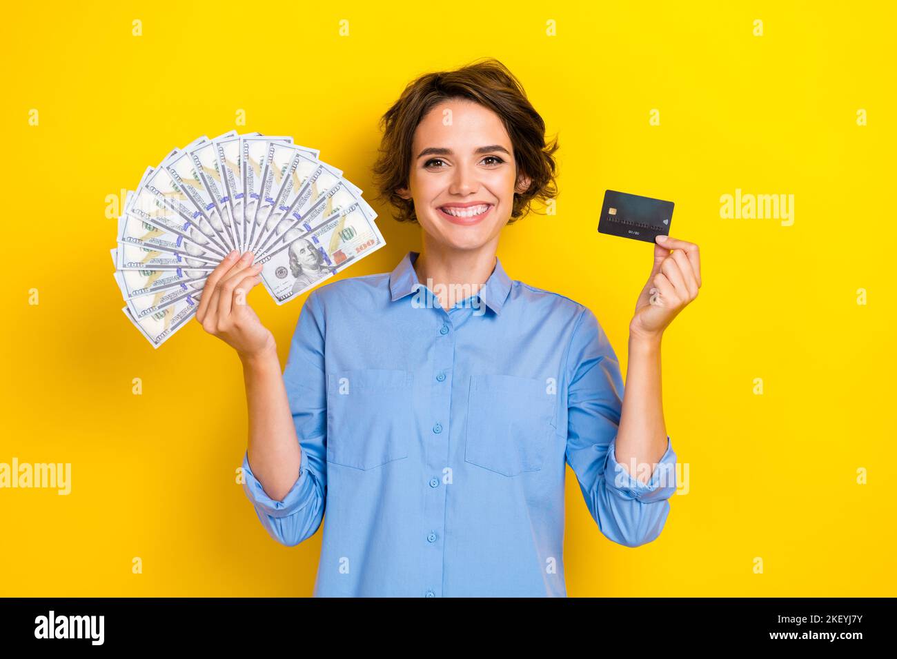 Photo of lovely nice girl with bob hairdo dressed blue shirt hold ...