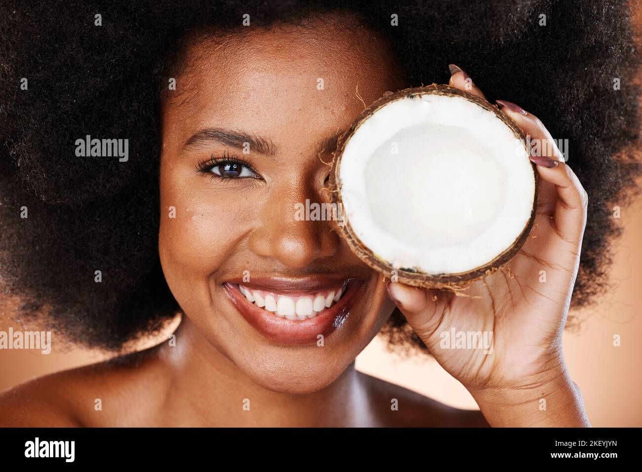 Coconut, skincare and beauty of a black woman model smile about ...
