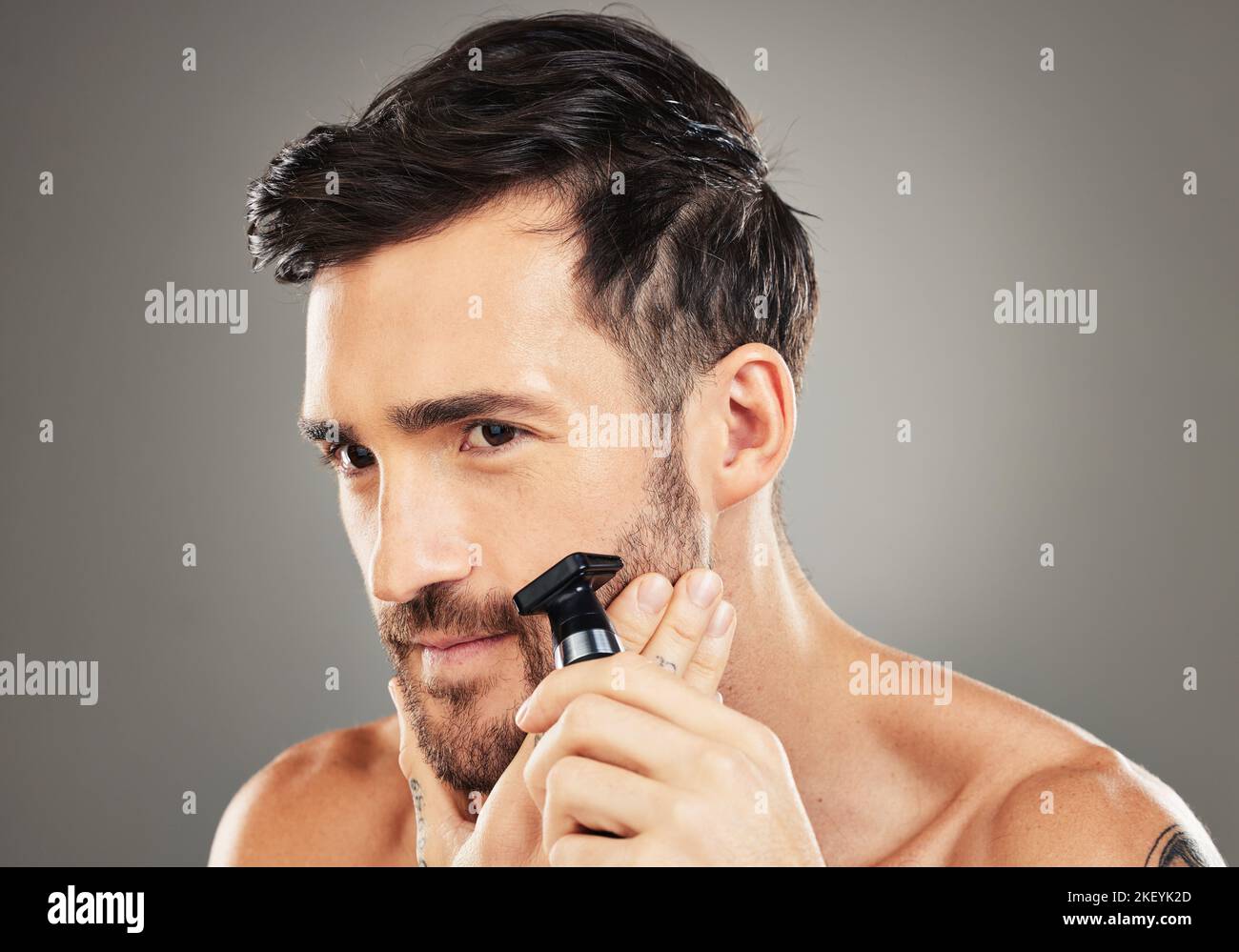Thinking, shaving and man with a razor for his face, skincare and ...