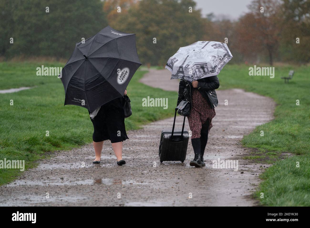 London UK. 15 November 2022. Walkers on Wimbledon Common battle against ...