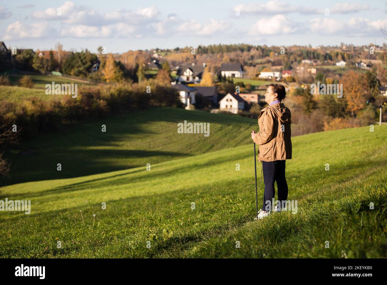 Active lifestyle elder lady nordic walking in the countryside Stock ...