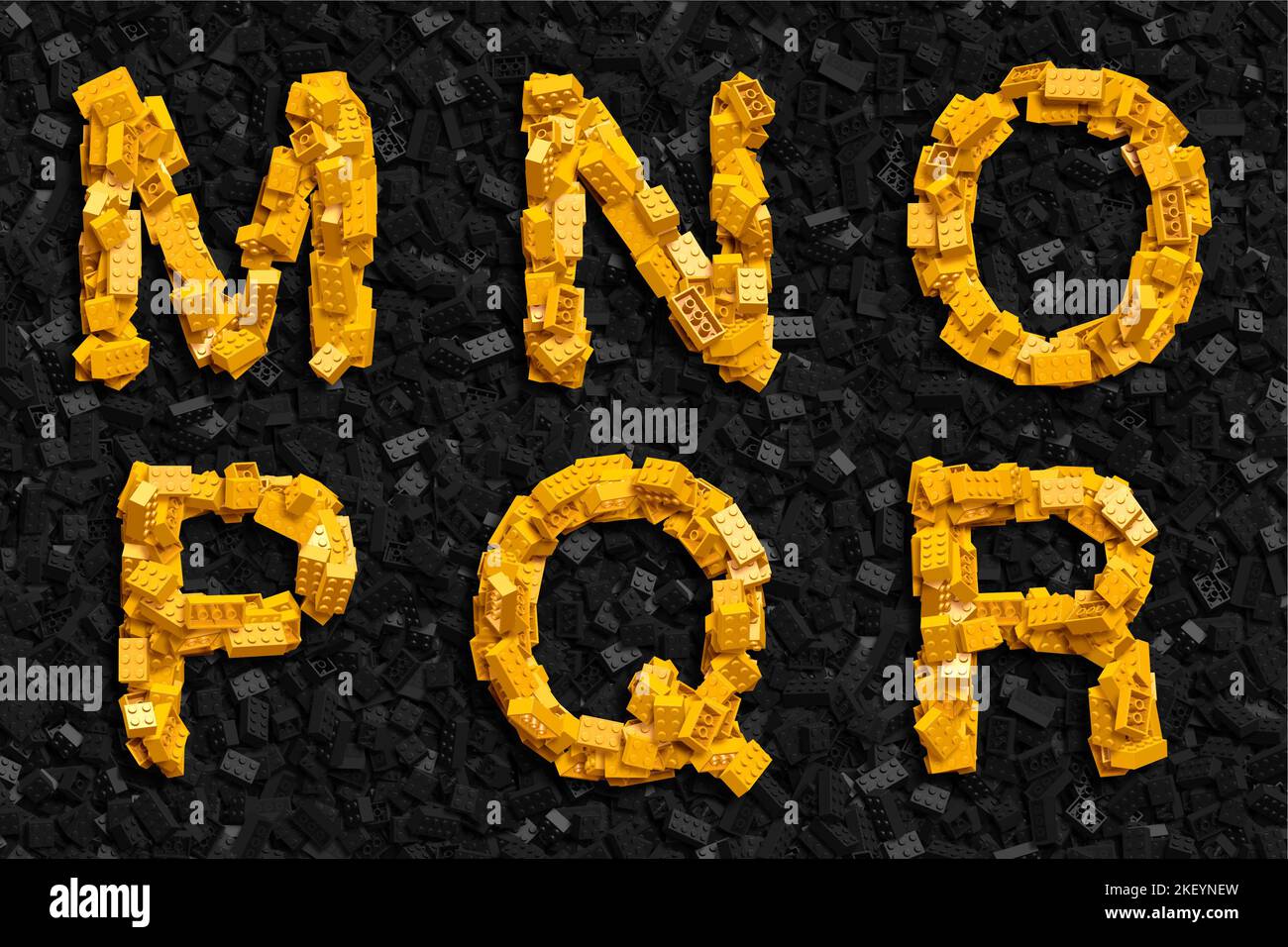 3d alphabet, set of yellow letters made of bricks on a dark background ...