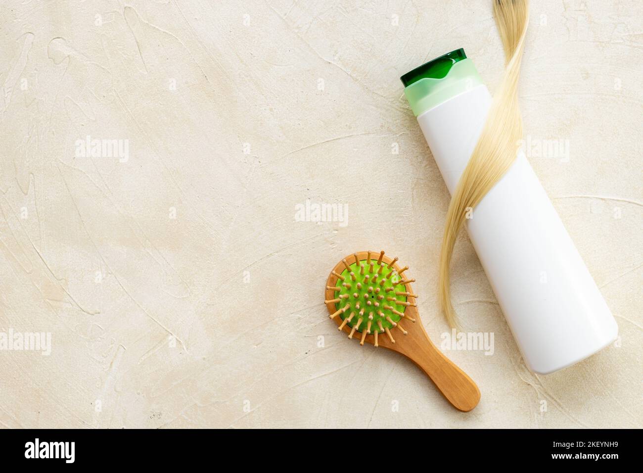 Shampoo for hair care with lock of female hair Stock Photo - Alamy