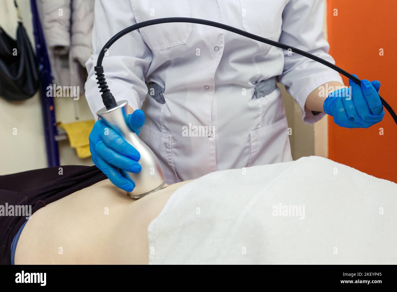 Radio frequency tummy tuck. Anti-cellulite massage with cavitation and ...