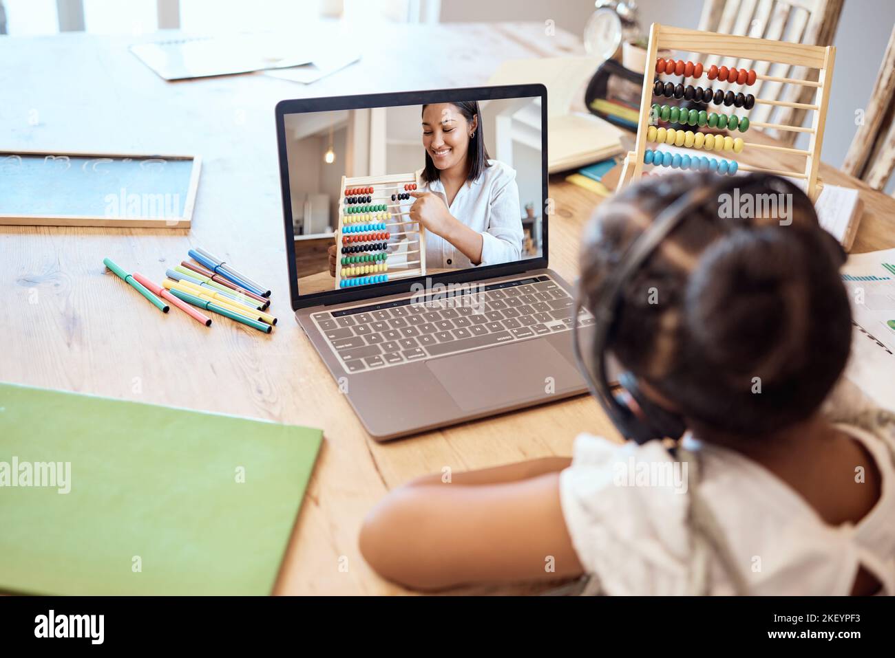 Kid student, study online with laptop and learning mathematics ...