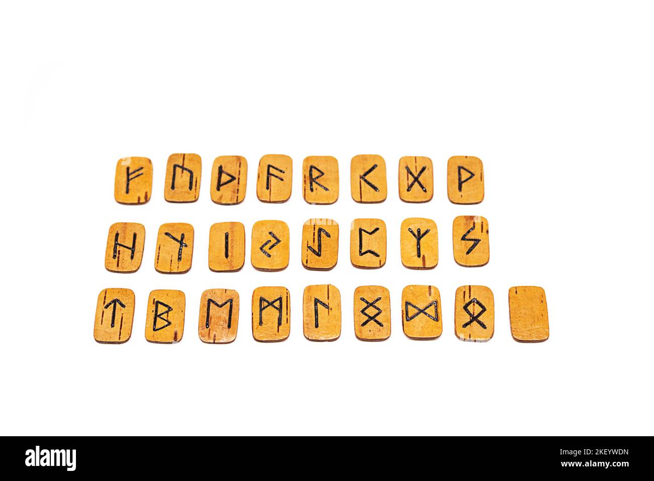 Handmade wooden runes on white. Set of Scandinavian runes for ...