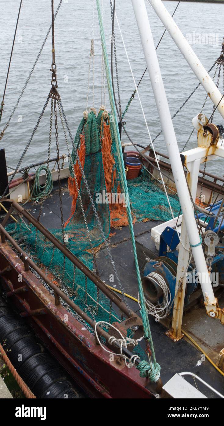 Colourful fishing nets drying on a trawler in Whitby harbour Stock ...