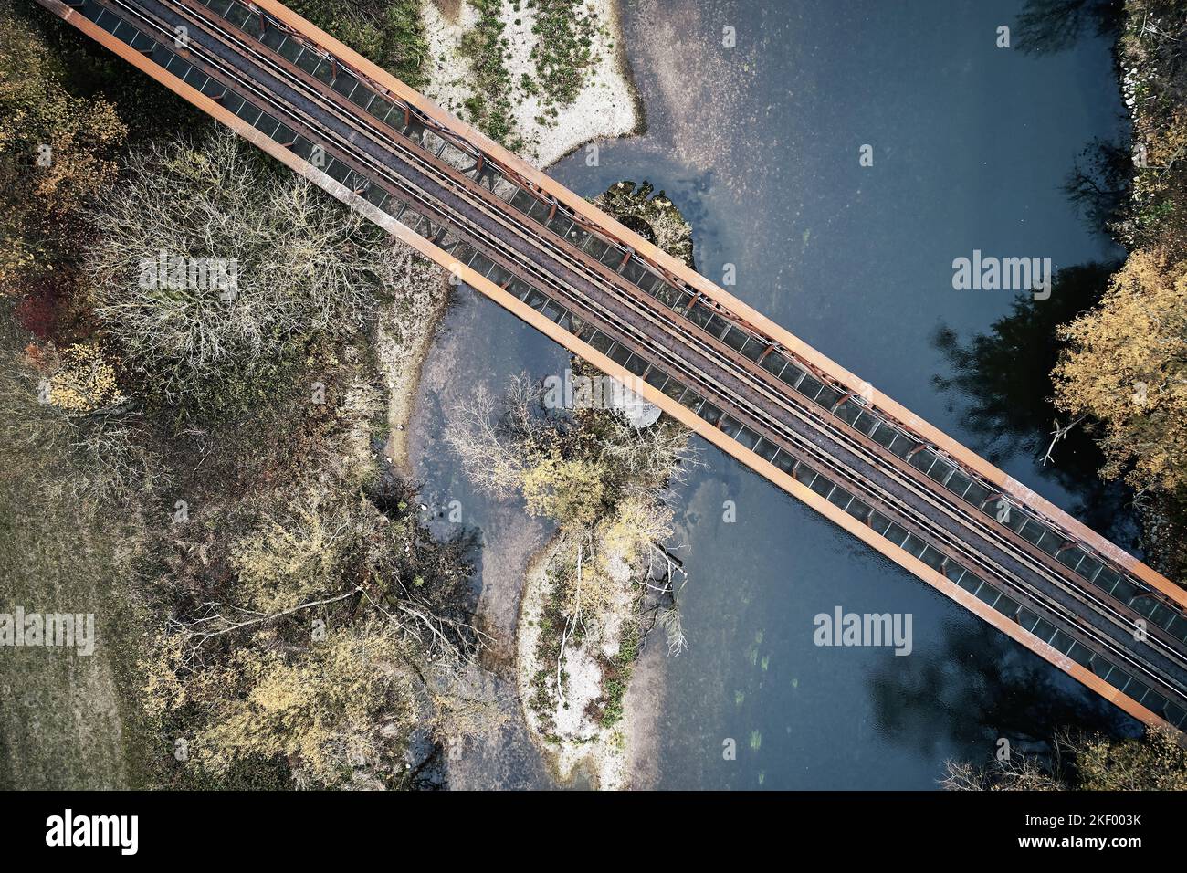 Aerial view of the railroad bridge above a river. Top view of the ...