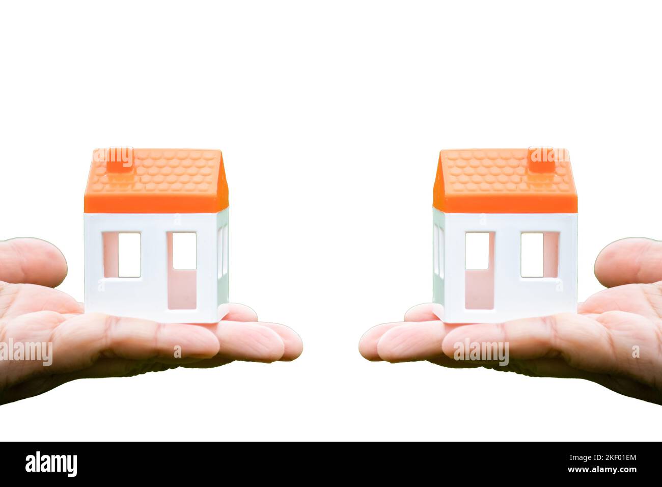 New home, right and left hand holding mutual house model isolated on ...