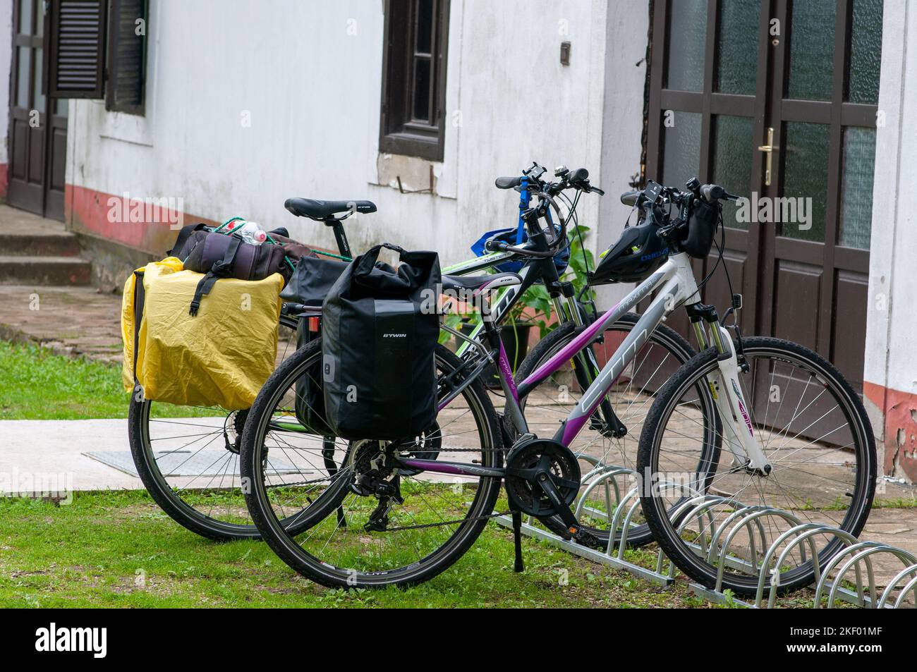 Cycling tour of Lake Balaton, Hungary. Cyclists at rest at a cafe Stock ...