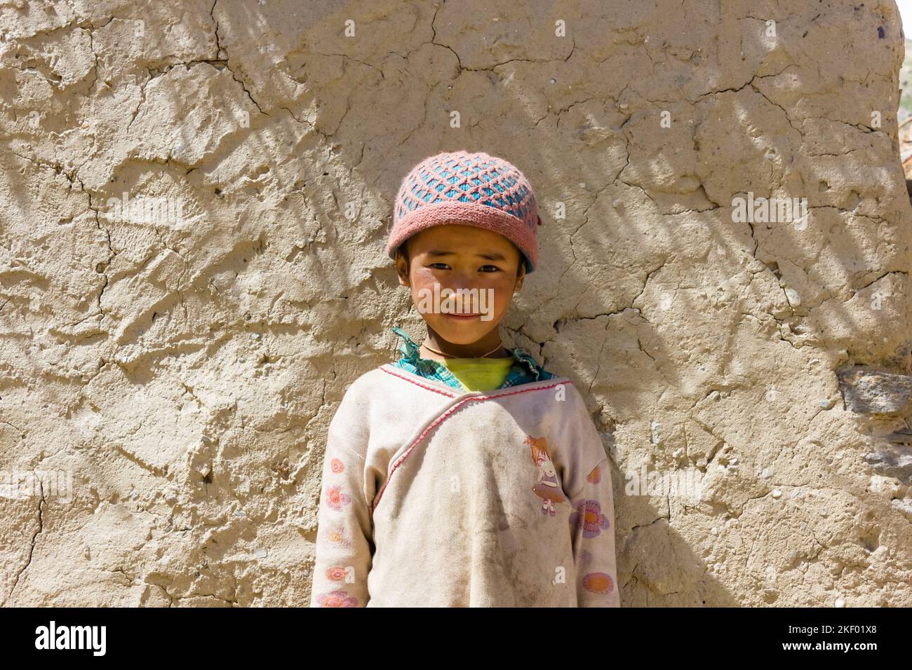Zanskar, India - July 2012: Portrait of a young girl wearing a woolen ...