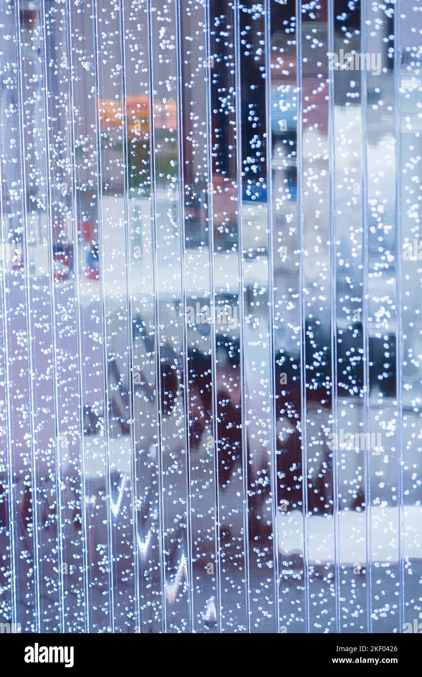 Decorative glass wall filled with water and oxygen bulbs Stock Photo ...
