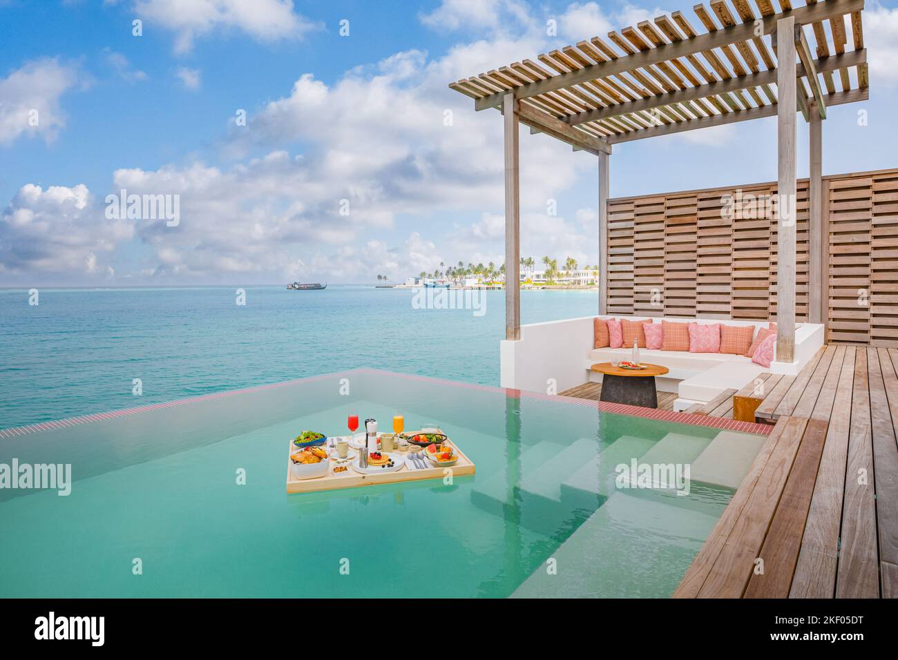 Breakfast in swimming pool floating. Luxury summer vacation or ...
