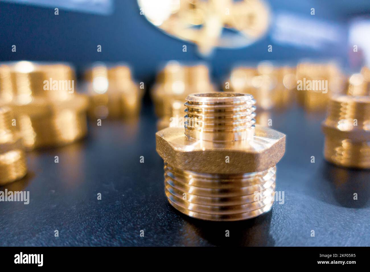 Threaded fittings. Brass nickel-plated fitting Stock Photo - Alamy