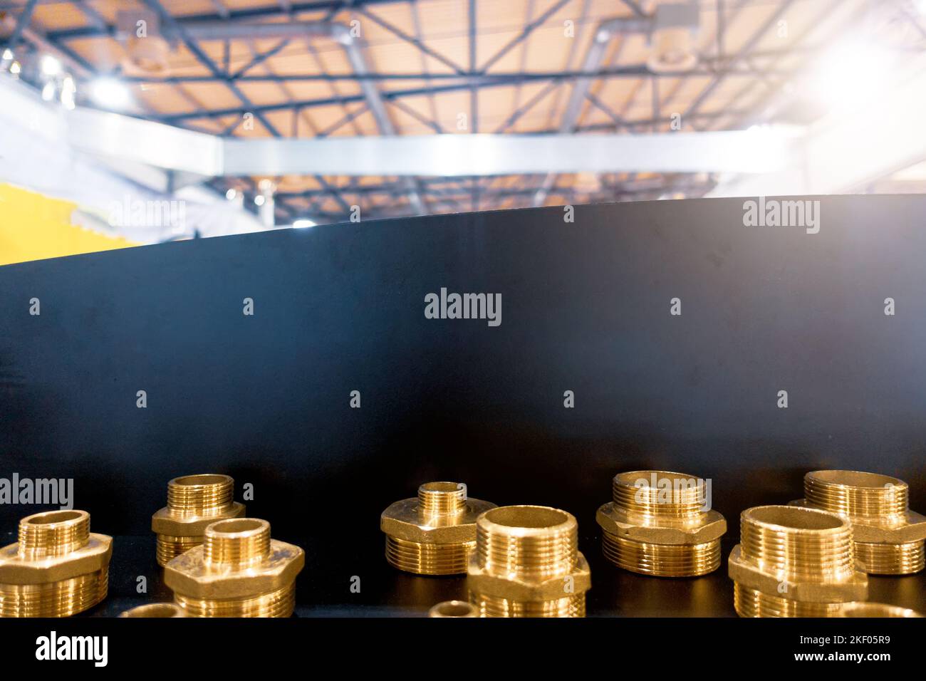 Threaded fittings. Brass nickel-plated fitting Stock Photo - Alamy