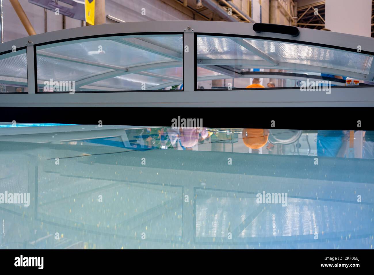 Pool cover. The telescopic swimming pool enclosure Stock Photo - Alamy