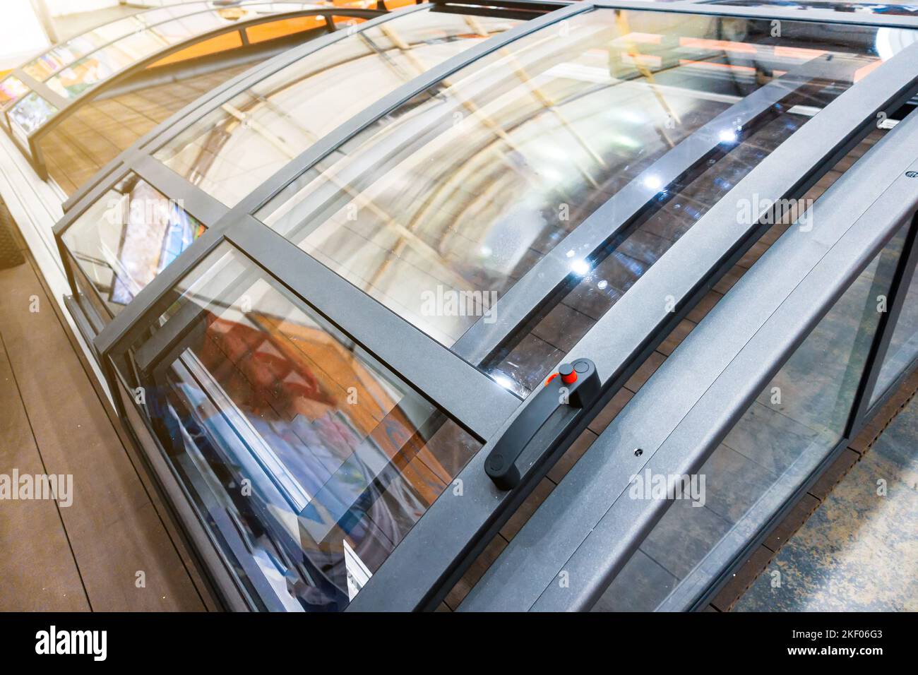 Pool cover. The telescopic swimming pool enclosure Stock Photo - Alamy
