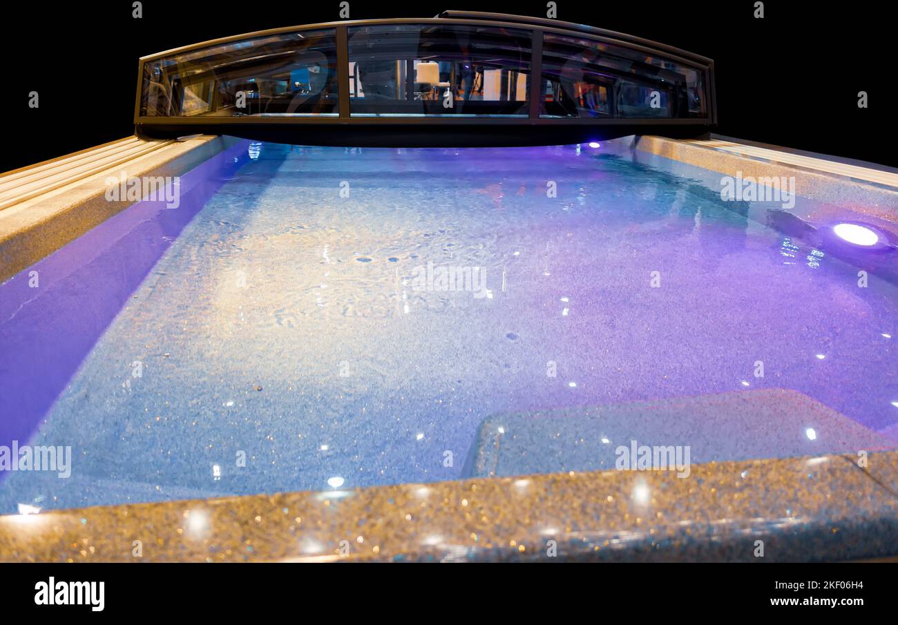 Pool cover. The telescopic swimming pool enclosure Stock Photo - Alamy
