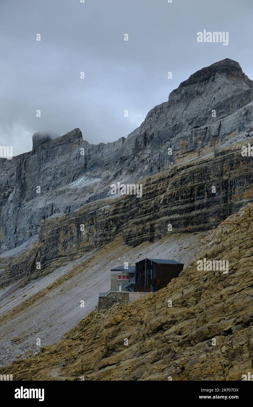 A vertical of Refuge des Sarradets (Midground) and le Casque du Marbore ...