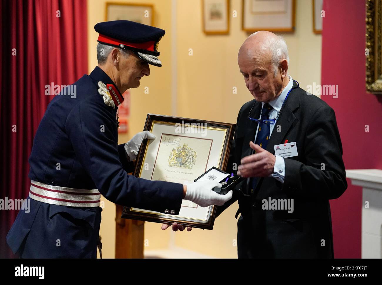 Nigel Atkinson, the Lord Lieutenant of Hampshire (left) presents Mr ...