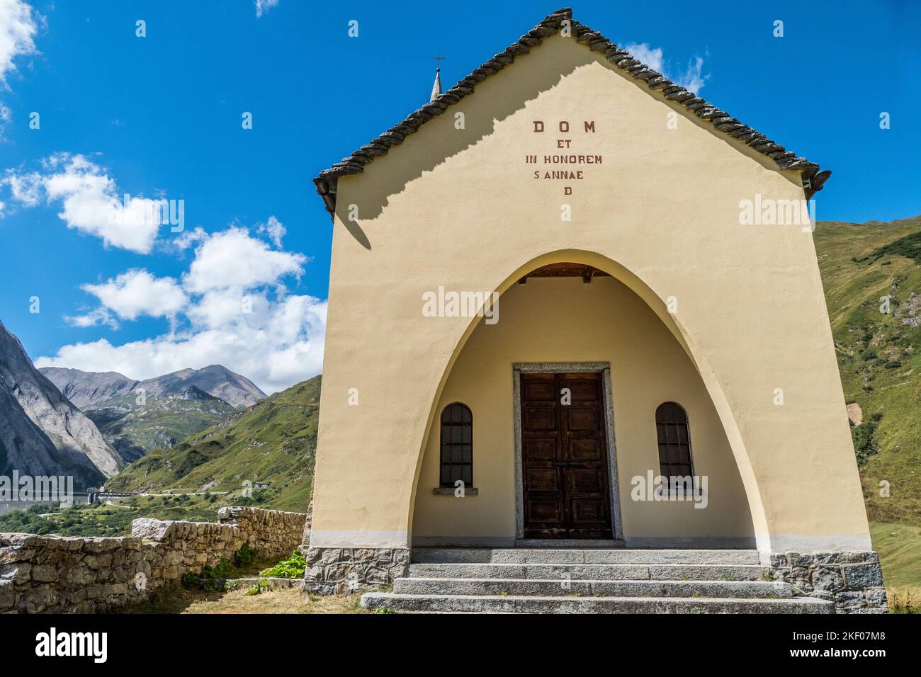 beautiful little catholic church on top of a hill in the mountains in ...