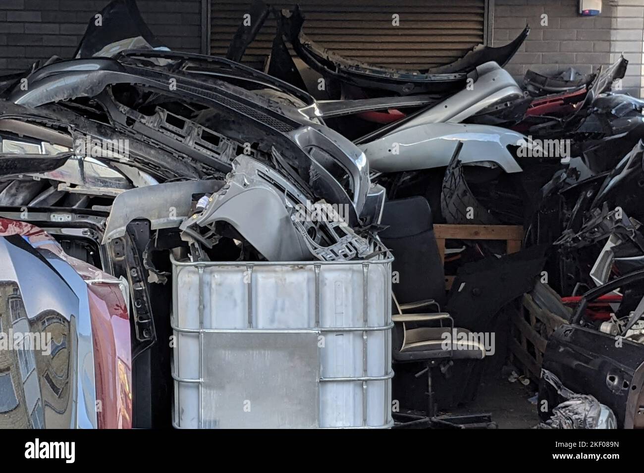 Pile of scrap metal car parts. Old, useless, worn out, broken metal and ...