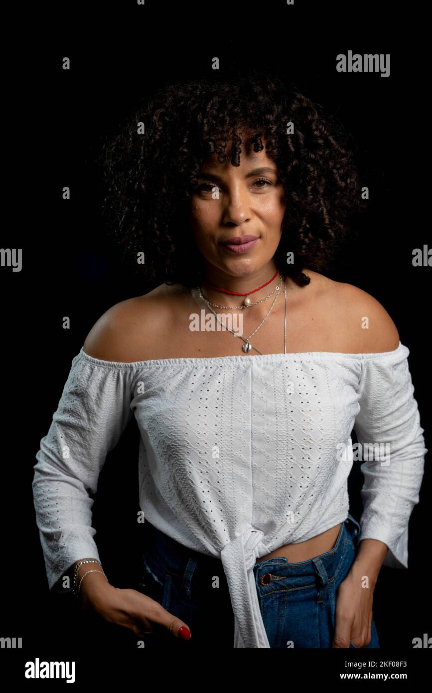 Beautiful woman portrait against black background. Mature woman. Self ...